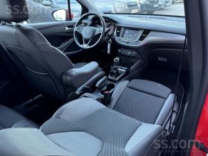 Red Opel Crossland X 2018 in Riga, with an engine capacity of 1.20 L and mileage of 125 thousand km for 8300 €, photo 13 on AUTOMOTO.COM.LV