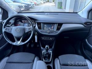 Red Opel Crossland X 2018 in Riga, with an engine capacity of 1.20 L and mileage of 125 thousand km for 8300 €, photo 14 on AUTOMOTO.COM.LV