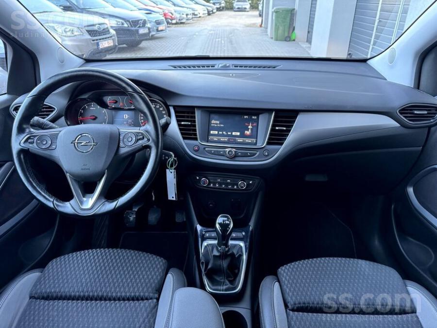 Red Opel Crossland X 2018 in Riga, with an engine capacity of 1.20 L and mileage of 125 thousand km for 8300 €, photo 14 on AUTOMOTO.COM.LV
