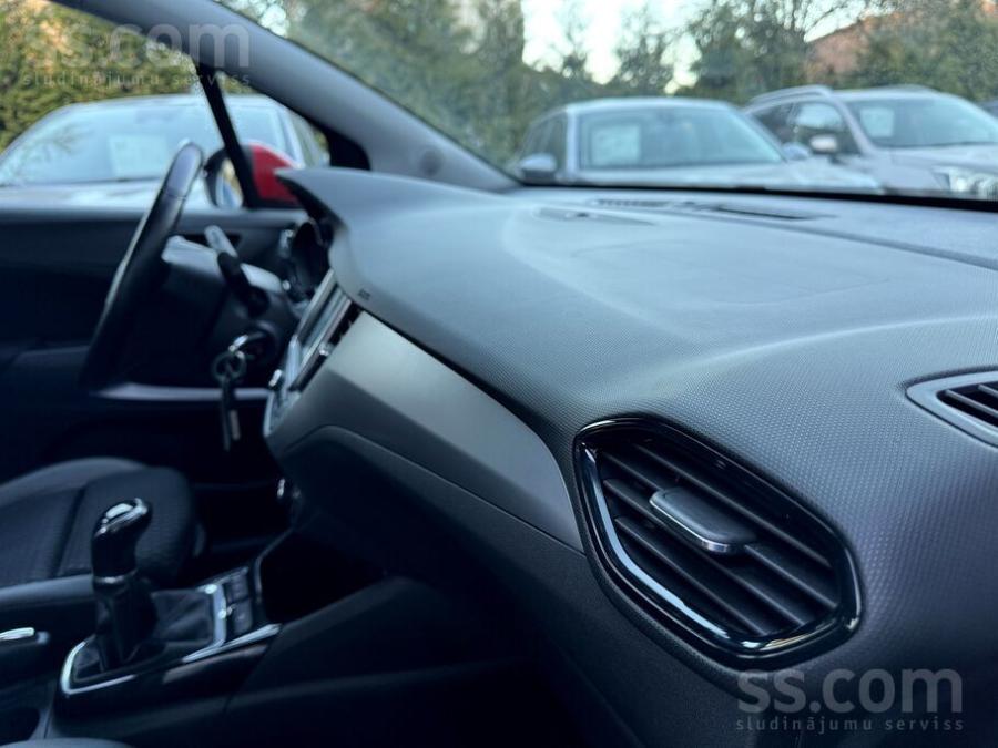 Red Opel Crossland X 2018 in Riga, with an engine capacity of 1.20 L and mileage of 125 thousand km for 8300 €, photo 15 on AUTOMOTO.COM.LV