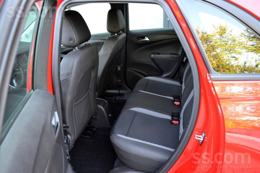 Red Opel Crossland X 2018 in Riga, with an engine capacity of 1.20 L and mileage of 125 thousand km for 8300 €, photo 17 on AUTOMOTO.COM.LV