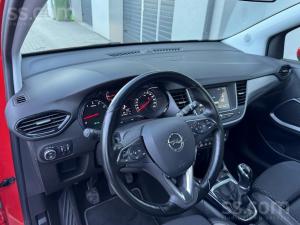 Red Opel Crossland X 2018 in Riga, with an engine capacity of 1.20 L and mileage of 125 thousand km for 8300 €, photo 20 on AUTOMOTO.COM.LV