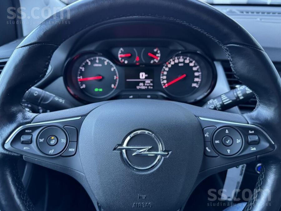 Red Opel Crossland X 2018 in Riga, with an engine capacity of 1.20 L and mileage of 125 thousand km for 8300 €, photo 21 on AUTOMOTO.COM.LV