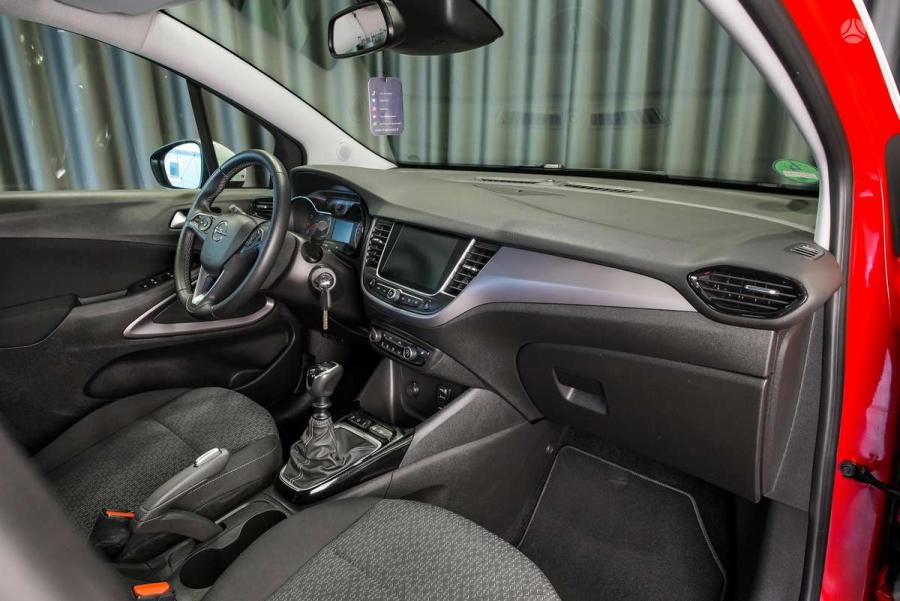 Red Opel Crossland X 2019 in Marijampole, with an engine capacity of 1.20 L and mileage of 105 thousand km for 7950 €, photo 35 on AUTOMOTO.COM.LV