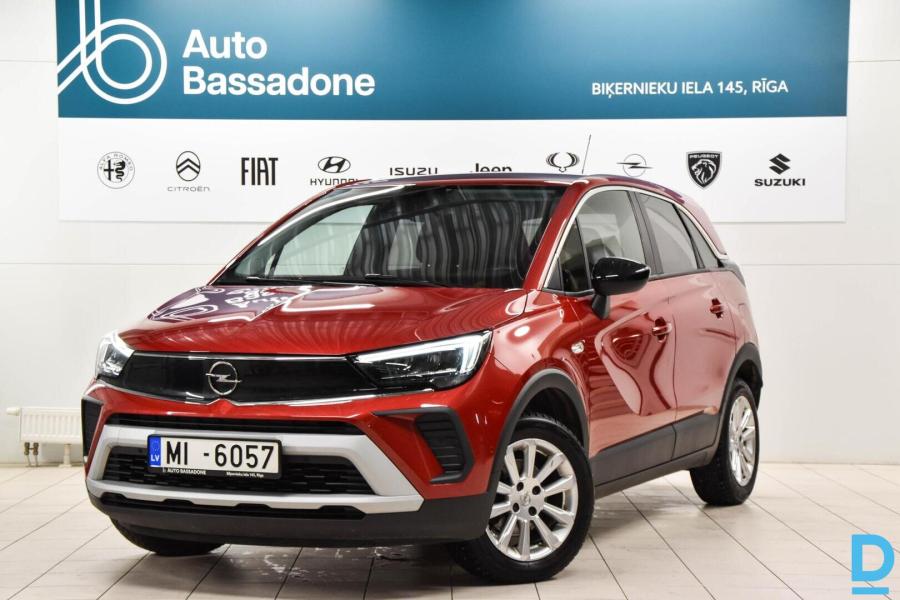 Red Opel Crossland X 2021 in Riga, with an engine capacity of 1.20 L and mileage of 67 thousand km for 14790 €, photo 1 on AUTOMOTO.COM.LV