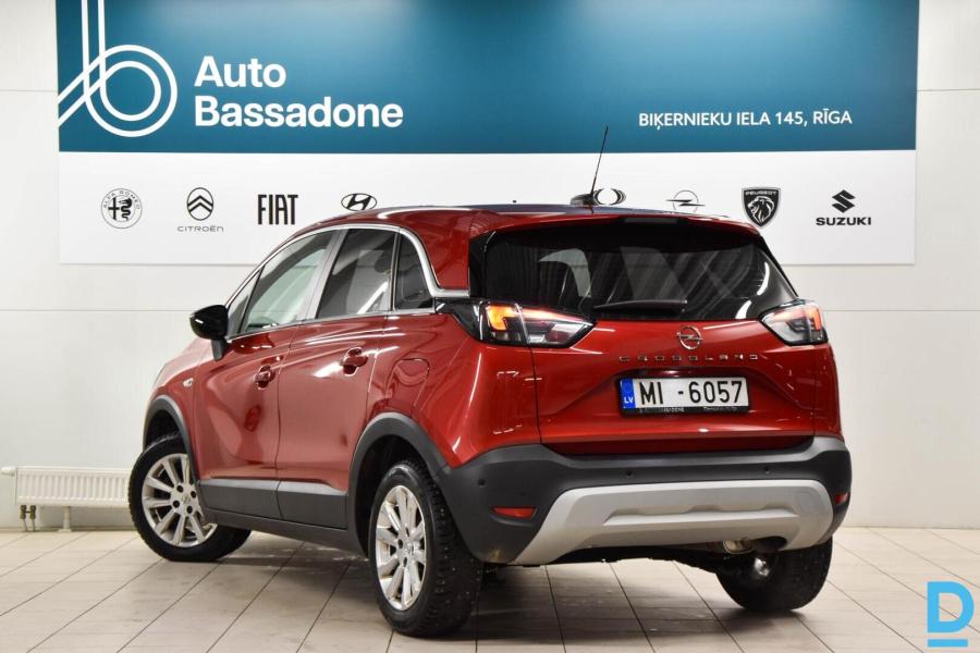 Red Opel Crossland X 2021 in Riga, with an engine capacity of 1.20 L and mileage of 67 thousand km for 14790 €, photo 2 on AUTOMOTO.COM.LV