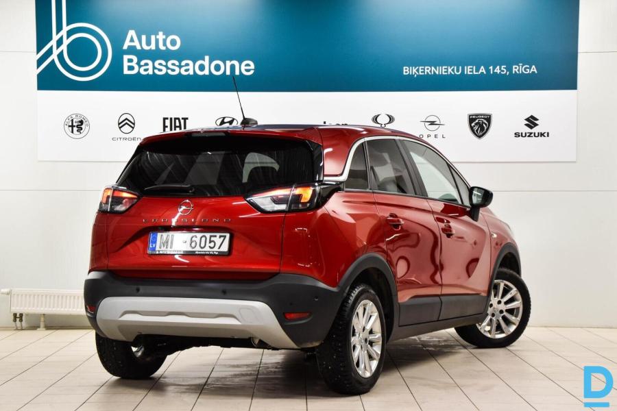 Red Opel Crossland X 2021 in Riga, with an engine capacity of 1.20 L and mileage of 67 thousand km for 14790 €, photo 3 on AUTOMOTO.COM.LV