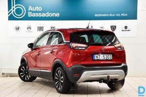 Red Opel Crossland X 2023 in Riga, with an engine capacity of 1.20 L and mileage of 6 thousand km for 17490 €, photo 2 on AUTOMOTO.COM.LV