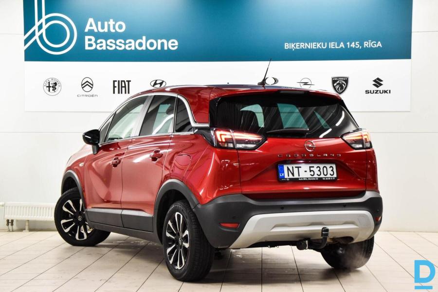 Red Opel Crossland X 2023 in Riga, with an engine capacity of 1.20 L and mileage of 6 thousand km for 17490 €, photo 2 on AUTOMOTO.COM.LV