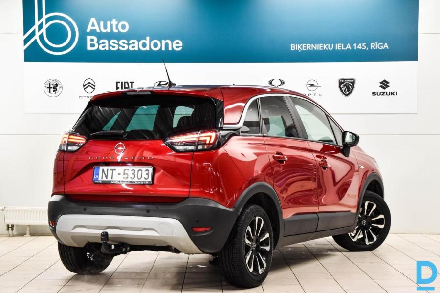 Red Opel Crossland X 2023 in Riga, with an engine capacity of 1.20 L and mileage of 6 thousand km for 17490 €, photo 4 on AUTOMOTO.COM.LV
