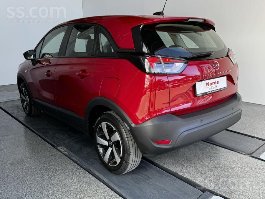 Red Opel Crossland X 2021 in Riga, with an engine capacity of 1.20 L and mileage of 54 thousand km for 9500 €, photo 3 on AUTOMOTO.COM.LV