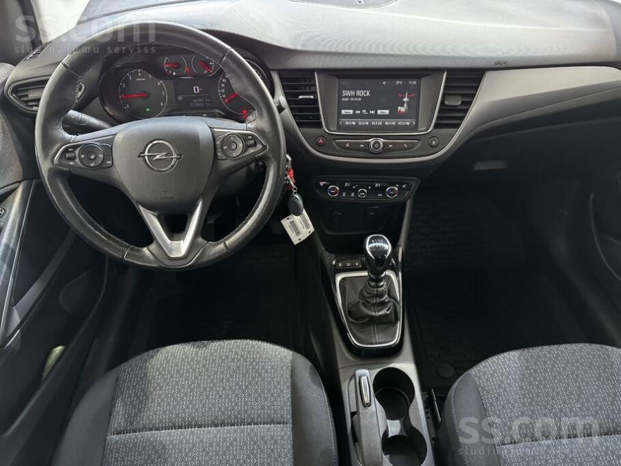 Red Opel Crossland X 2021 in Riga, with an engine capacity of 1.20 L and mileage of 54 thousand km for 9500 €, photo 5 on AUTOMOTO.COM.LV