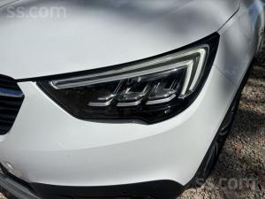 White Opel Crossland X 2017 in Cesis, with an engine capacity of 1.20 L and mileage of 0 thousand km for 10700 €, photo 7 on AUTOMOTO.COM.LV