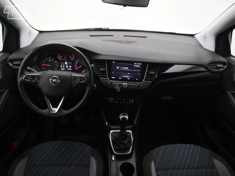 White Opel Crossland X 2019 in Vilnius, with an engine capacity of 1.20 L and mileage of 176 thousand km for 8699 €, photo 3 on AUTOMOTO.COM.LV
