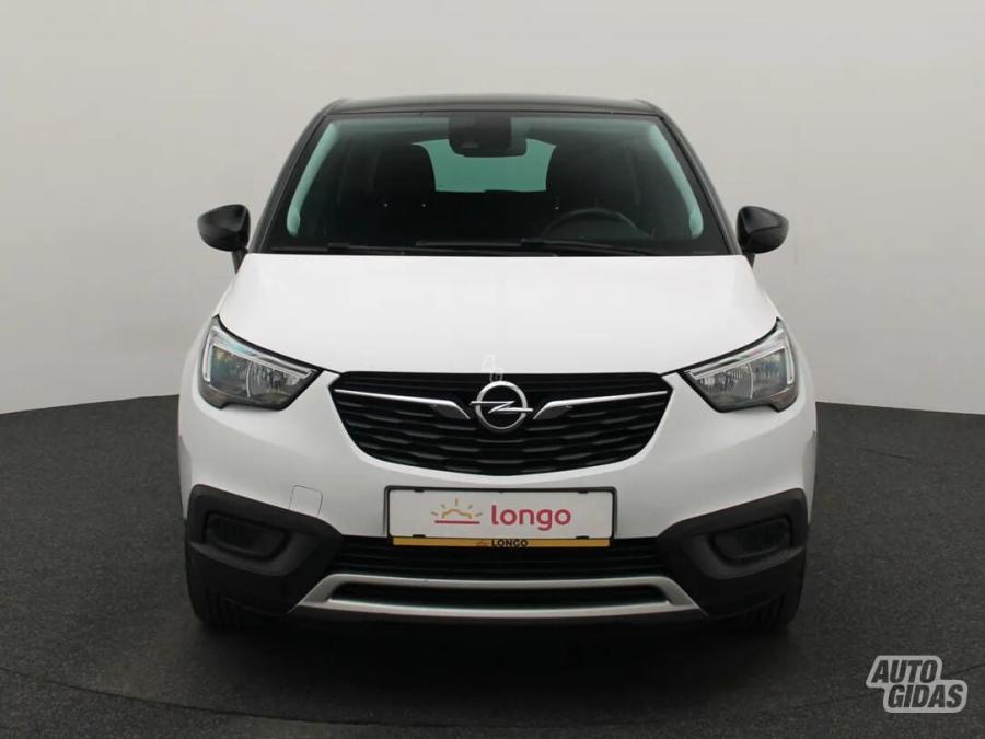 White Opel Crossland X 2019 in Vilnius, with an engine capacity of 1.20 L and mileage of 176 thousand km for 8699 €, photo 4 on AUTOMOTO.COM.LV