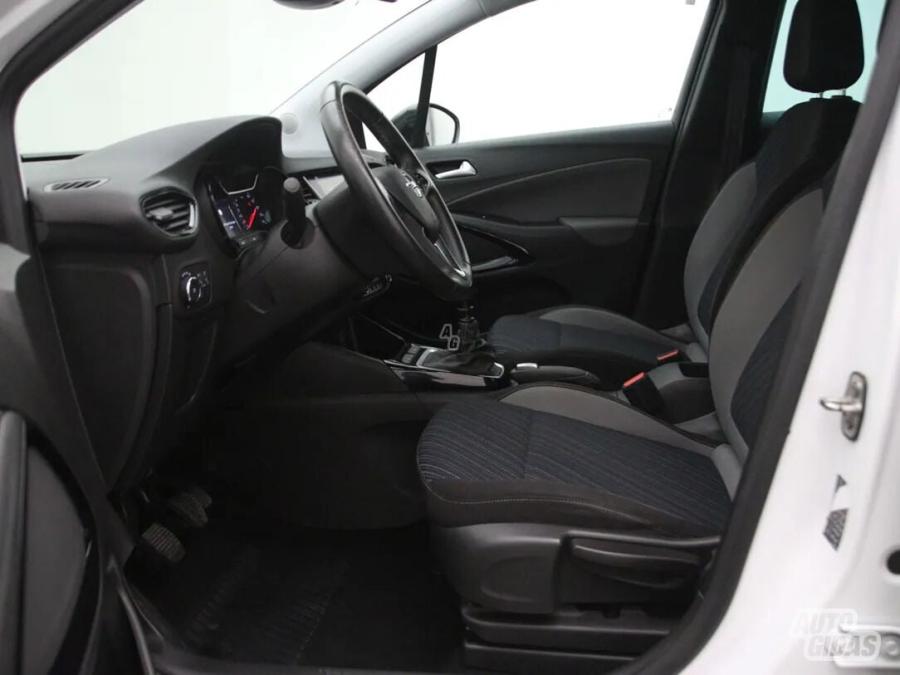 White Opel Crossland X 2019 in Vilnius, with an engine capacity of 1.20 L and mileage of 176 thousand km for 8699 €, photo 5 on AUTOMOTO.COM.LV