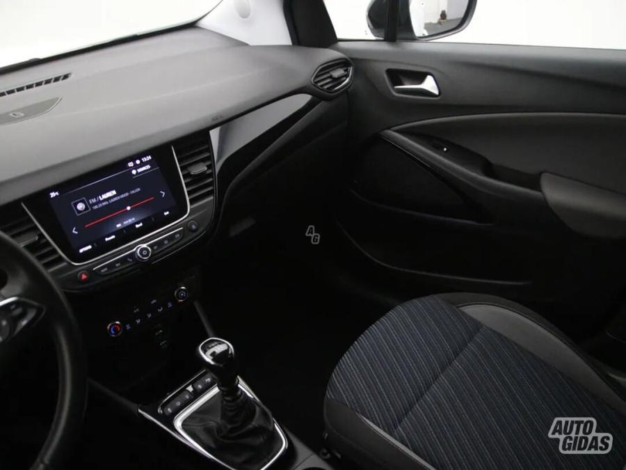 White Opel Crossland X 2019 in Vilnius, with an engine capacity of 1.20 L and mileage of 176 thousand km for 8699 €, photo 22 on AUTOMOTO.COM.LV