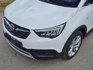 White Opel Crossland X 2019 in Rokiskis, with an engine capacity of 1.20 L and mileage of 103 thousand km for 9650 €, photo 3 on AUTOMOTO.COM.LV