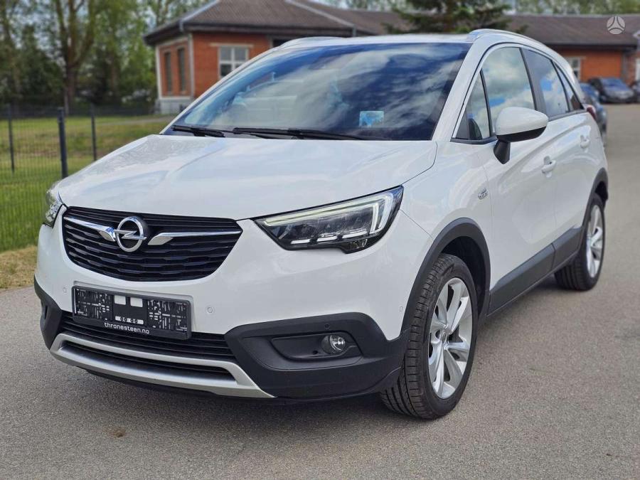 White Opel Crossland X 2019 in Rokiskis, with an engine capacity of 1.20 L and mileage of 103 thousand km for 9650 €, photo 5 on AUTOMOTO.COM.LV