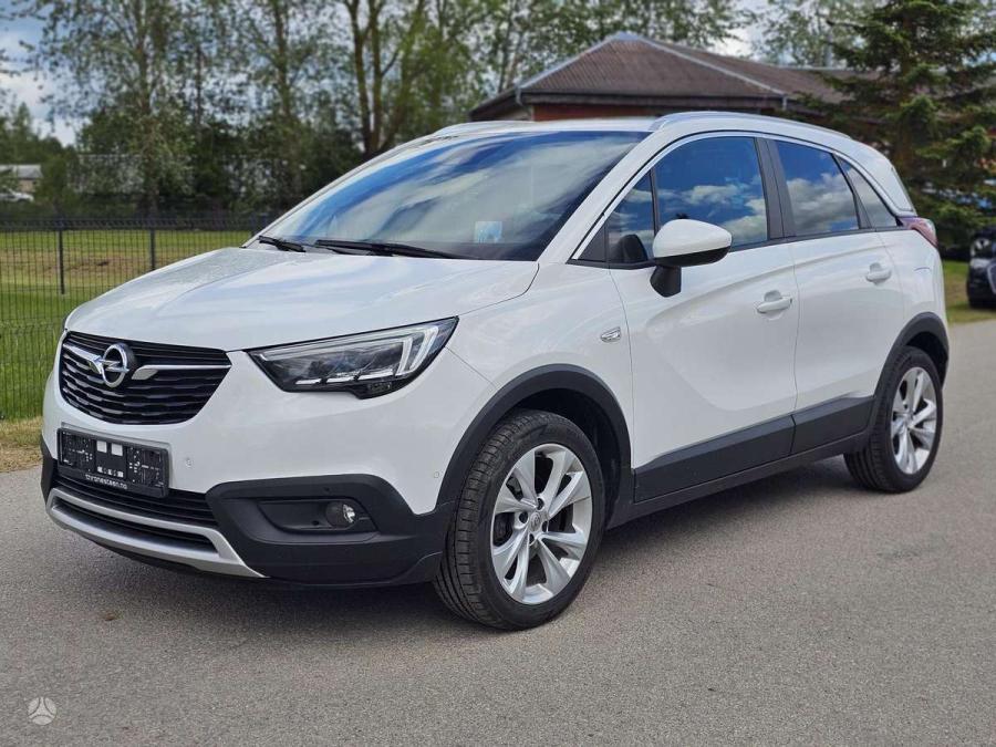 White Opel Crossland X 2019 in Rokiskis, with an engine capacity of 1.20 L and mileage of 103 thousand km for 9650 €, photo 6 on AUTOMOTO.COM.LV