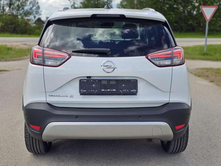 White Opel Crossland X 2019 in Rokiskis, with an engine capacity of 1.20 L and mileage of 103 thousand km for 9650 €, photo 7 on AUTOMOTO.COM.LV
