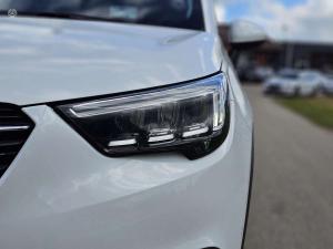 White Opel Crossland X 2019 in Rokiskis, with an engine capacity of 1.20 L and mileage of 103 thousand km for 9650 €, photo 8 on AUTOMOTO.COM.LV
