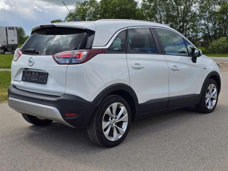 White Opel Crossland X 2019 in Rokiskis, with an engine capacity of 1.20 L and mileage of 103 thousand km for 9650 €, photo 12 on AUTOMOTO.COM.LV