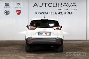 White Opel Crossland X 2021 in Riga, with an engine capacity of 1.20 L and mileage of 70 thousand km for 9490 €, photo 8 on AUTOMOTO.COM.LV
