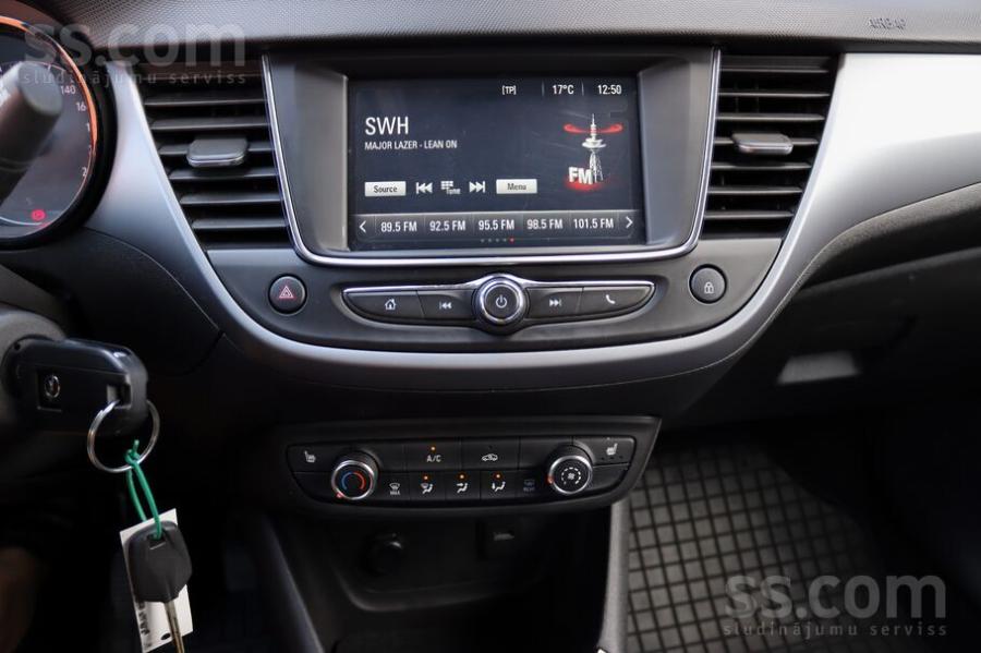 White Opel Crossland X 2021 in Riga, with an engine capacity of 1.20 L and mileage of 70 thousand km for 9490 €, photo 13 on AUTOMOTO.COM.LV