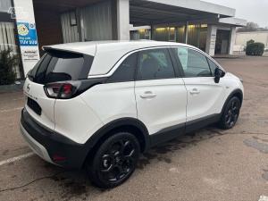 White Opel Crossland X 2023 in Kaunas, with an engine capacity of 1.20 L and mileage of 12 thousand km for 21594 €, photo 3 on AUTOMOTO.COM.LV