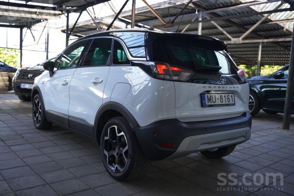 White Opel Crossland X 2021 in Riga, with an engine capacity of 1.20 L and mileage of 153 thousand km for 10990 €, photo 4 on AUTOMOTO.COM.LV