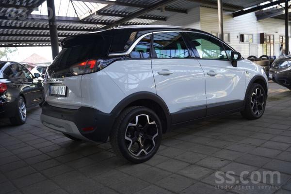 White Opel Crossland X 2021 in Riga, with an engine capacity of 1.20 L and mileage of 153 thousand km for 10990 €, photo 5 on AUTOMOTO.COM.LV