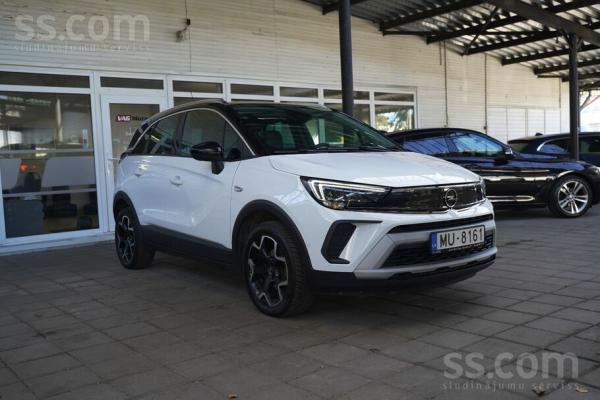 White Opel Crossland X 2021 in Riga, with an engine capacity of 1.20 L and mileage of 153 thousand km for 10990 €, photo 6 on AUTOMOTO.COM.LV