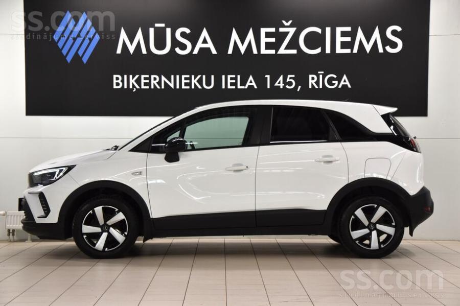White Opel Crossland X 2023 in Riga, with an engine capacity of 1.50 L and mileage of 143 thousand km for 10490 €, photo 6 on AUTOMOTO.COM.LV