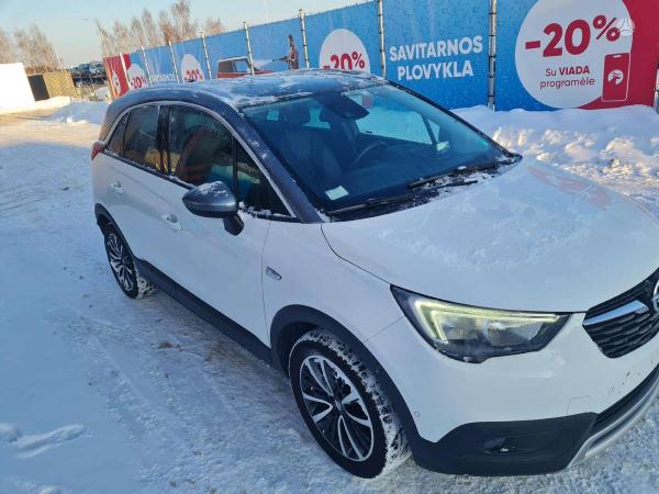White Opel Crossland X 2018 in Taurage, with an engine capacity of 1.20 L and mileage of 156 thousand km for 6150 €, photo 4 on AUTOMOTO.COM.LV