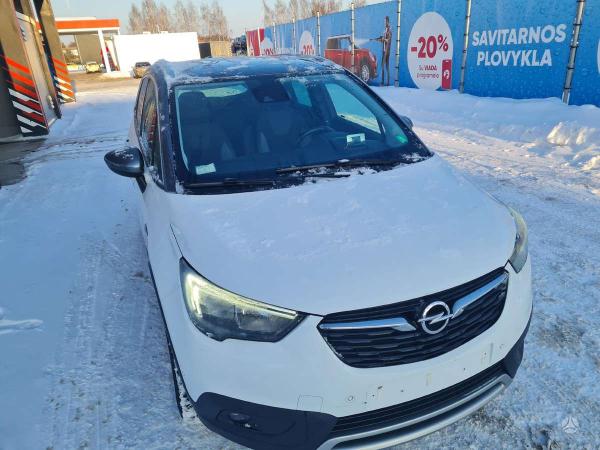White Opel Crossland X 2018 in Taurage, with an engine capacity of 1.20 L and mileage of 156 thousand km for 6150 €, photo 6 on AUTOMOTO.COM.LV