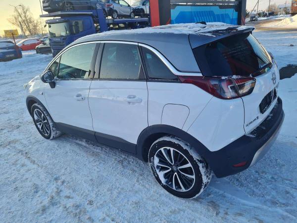 White Opel Crossland X 2018 in Taurage, with an engine capacity of 1.20 L and mileage of 156 thousand km for 6150 €, photo 10 on AUTOMOTO.COM.LV