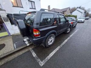 Black Opel Frontera 1999 in Ukmerge, with an engine capacity of 2.17 L and mileage of 189 thousand km for 2000 €, photo 2 on AUTOMOTO.COM.LV