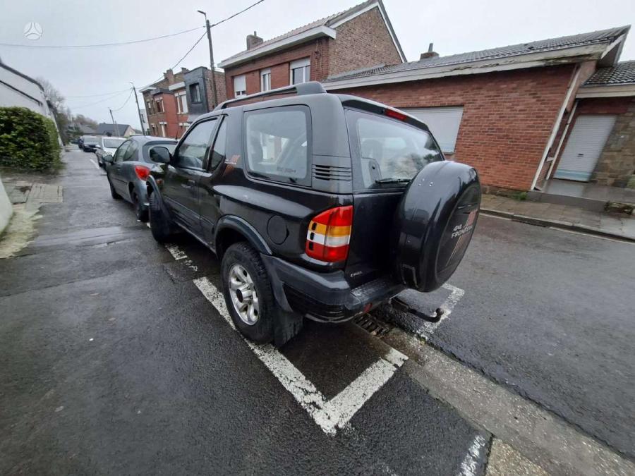 Black Opel Frontera 1999 in Ukmerge, with an engine capacity of 2.17 L and mileage of 189 thousand km for 2000 €, photo 6 on AUTOMOTO.COM.LV
