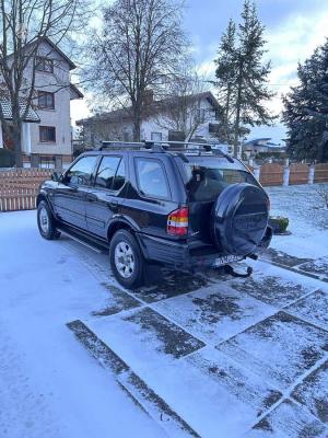 Black Opel Frontera 2003 in Marijampole, with an engine capacity of 2.17 L and mileage of 330 thousand km for 3000 €, photo 6 on AUTOMOTO.COM.LV