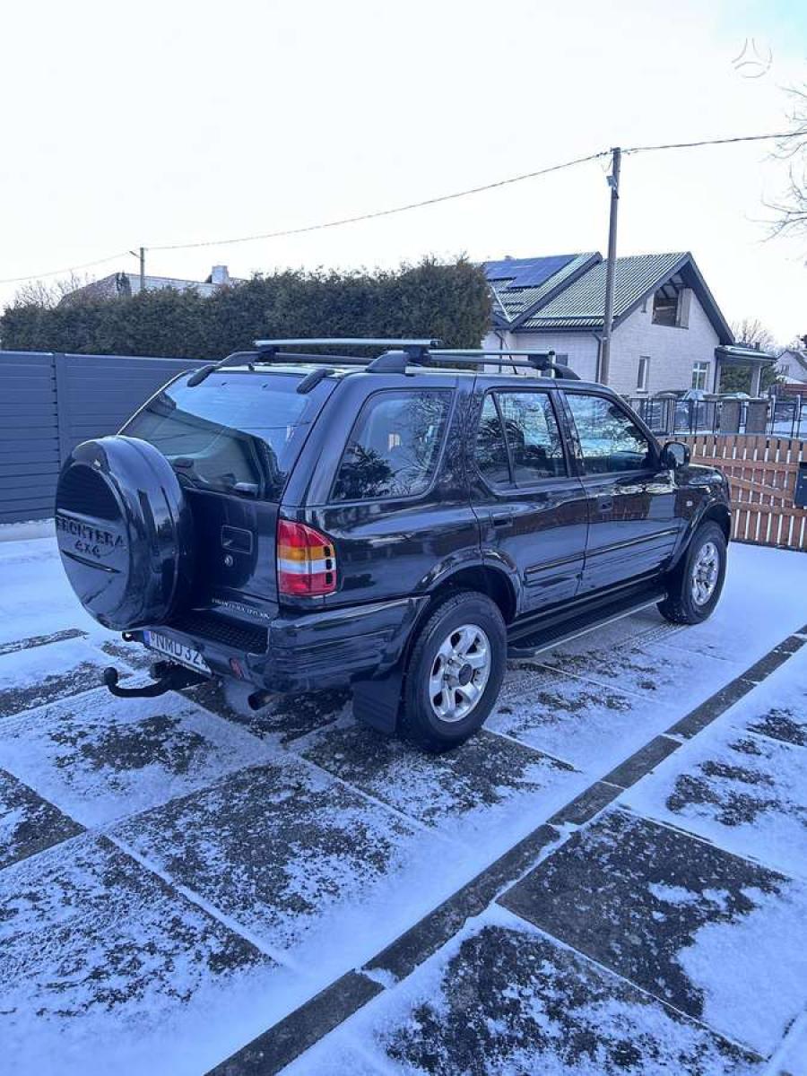 Black Opel Frontera 2003 in Marijampole, with an engine capacity of 2.17 L and mileage of 330 thousand km for 3000 €, photo 7 on AUTOMOTO.COM.LV