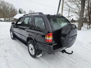 Black Opel Frontera 2003 in Jurbarkas, with an engine capacity of 2.20 L and mileage of 330 thousand km for 2850 €, photo 4 on AUTOMOTO.COM.LV