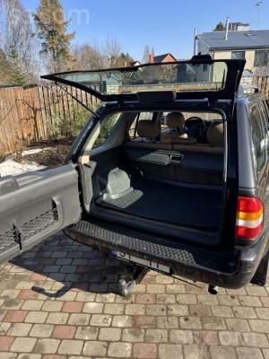 Black Opel Frontera 2004 in Riga, with an engine capacity of 2.20 L and mileage of 257 thousand km for 2700 €, photo 8 on AUTOMOTO.COM.LV