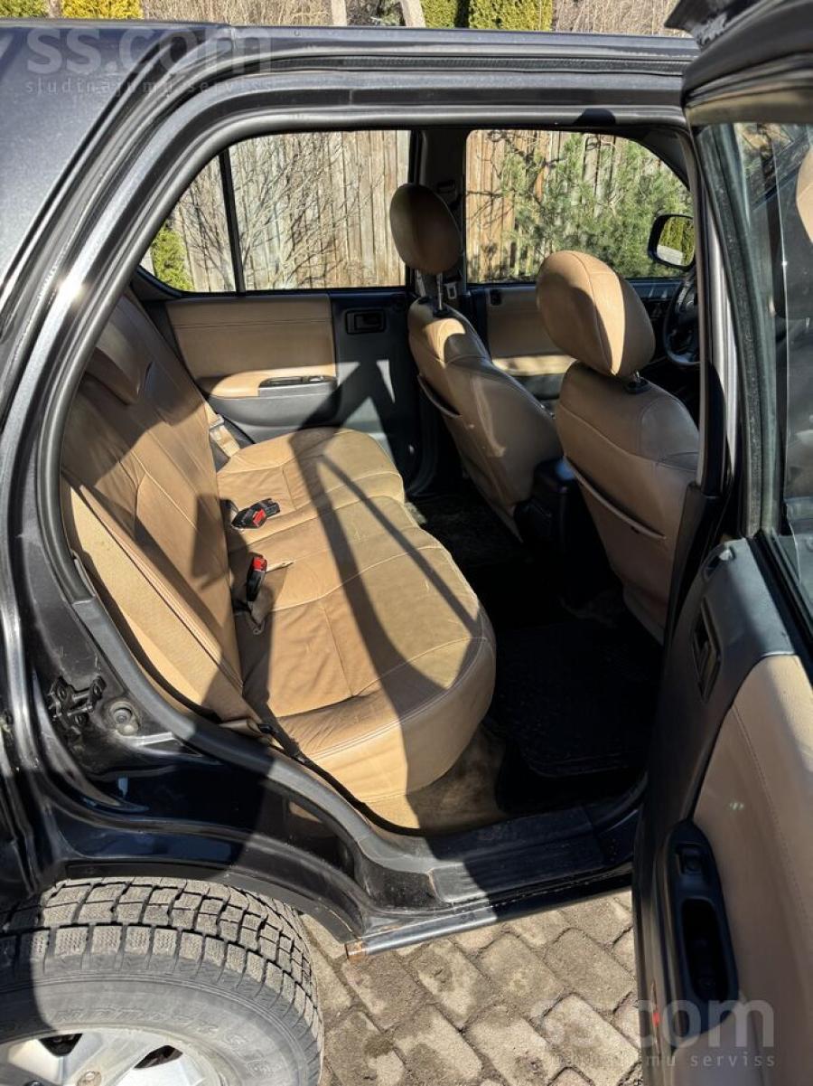 Black Opel Frontera 2004 in Riga, with an engine capacity of 2.20 L and mileage of 257 thousand km for 2500 €, photo 6 on AUTOMOTO.COM.LV