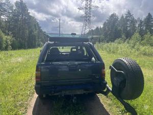 Green Opel Frontera 1995 in Vilnius, with an engine capacity of 2.26 L and mileage of 230 thousand km for 1950 €, photo 15 on AUTOMOTO.COM.LV