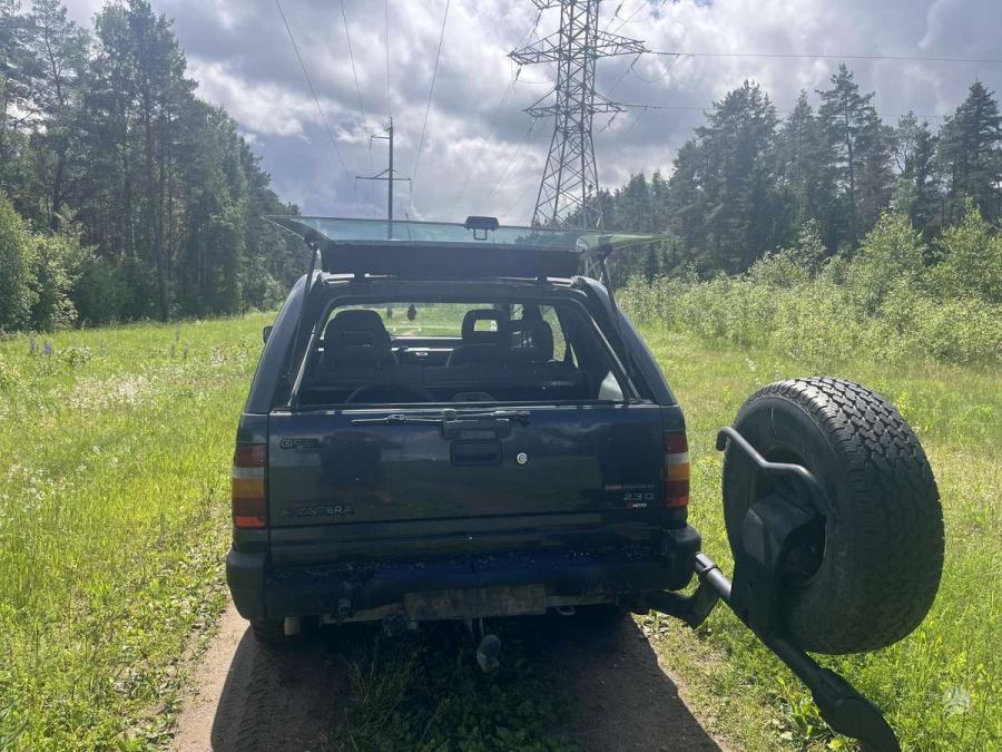 Green Opel Frontera 1995 in Vilnius, with an engine capacity of 2.26 L and mileage of 230 thousand km for 1950 €, photo 15 on AUTOMOTO.COM.LV