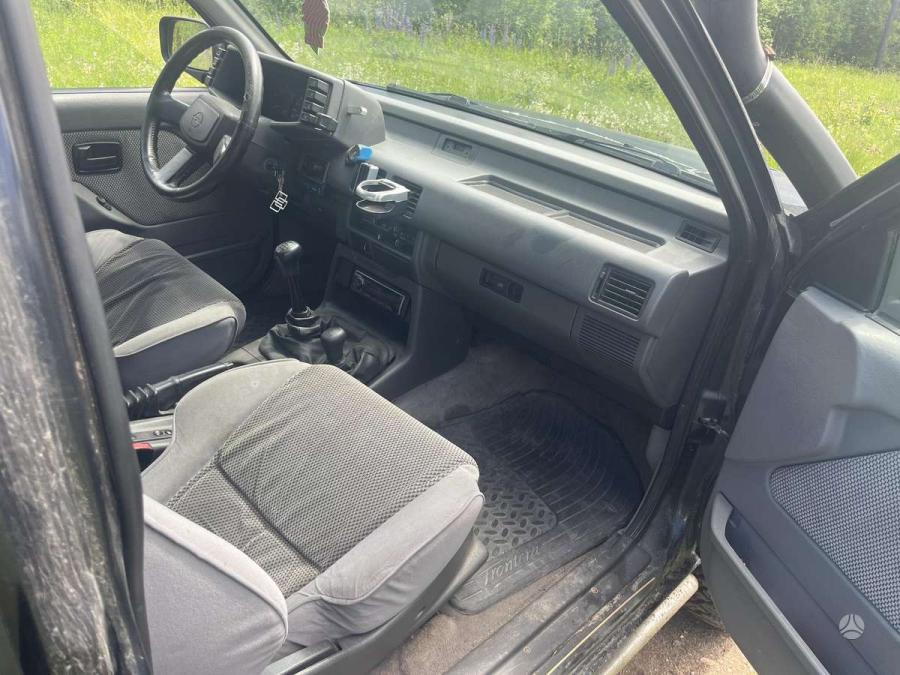 Green Opel Frontera 1995 in Vilnius, with an engine capacity of 2.26 L and mileage of 230 thousand km for 1950 €, photo 21 on AUTOMOTO.COM.LV