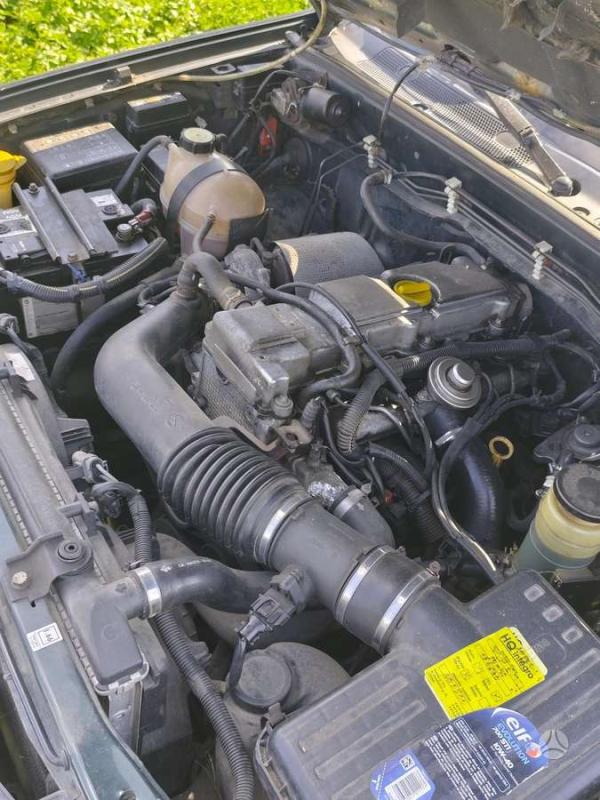 Green Opel Frontera 1999 in Prienai, with an engine capacity of 2.17 L and mileage of 254 thousand km for 450 €, photo 7 on AUTOMOTO.COM.LV