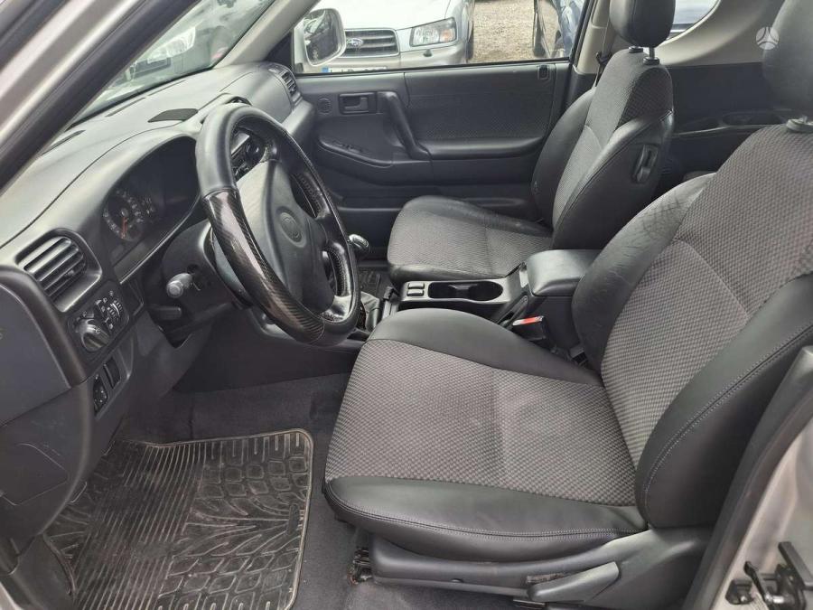Grey Opel Frontera 2002 in Jurbarkas, with an engine capacity of 2.20 L and mileage of 320 thousand km for 3200 €, photo 14 on AUTOMOTO.COM.LV