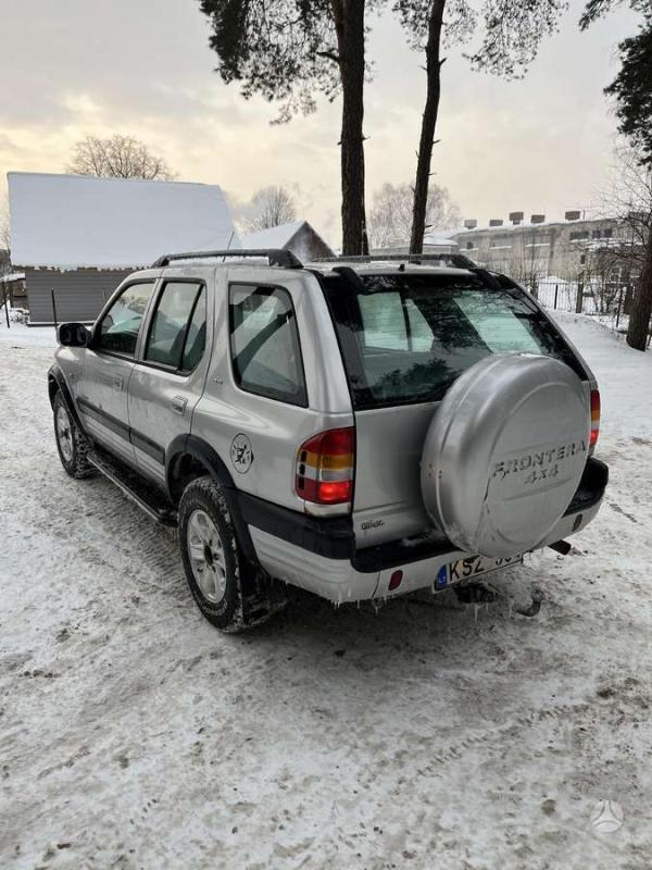 Grey Opel Frontera 2003 in Ukmerge, with an engine capacity of 2.17 L and mileage of 244 thousand km for 2300 €, photo 5 on AUTOMOTO.COM.LV